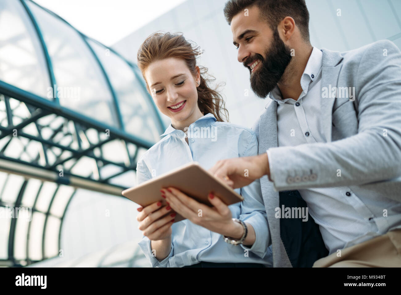Group businesspeople standing outside building hi-res stock photography ...