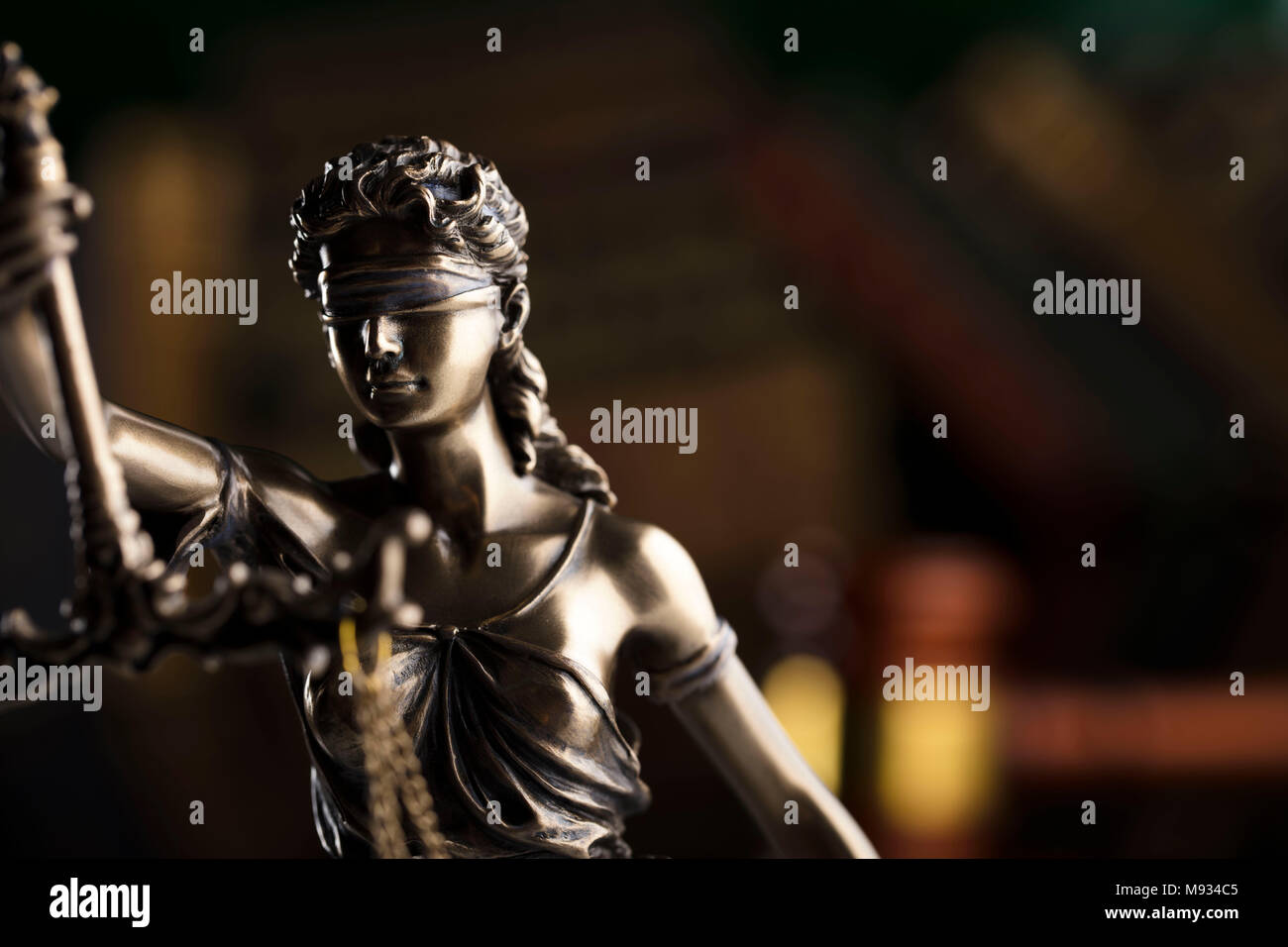 Lady justice on brown background Stock Photo - Alamy