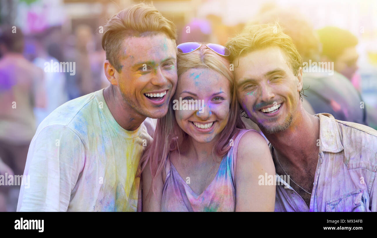 Young people enjoying summer festival, smiling friends having fun ...