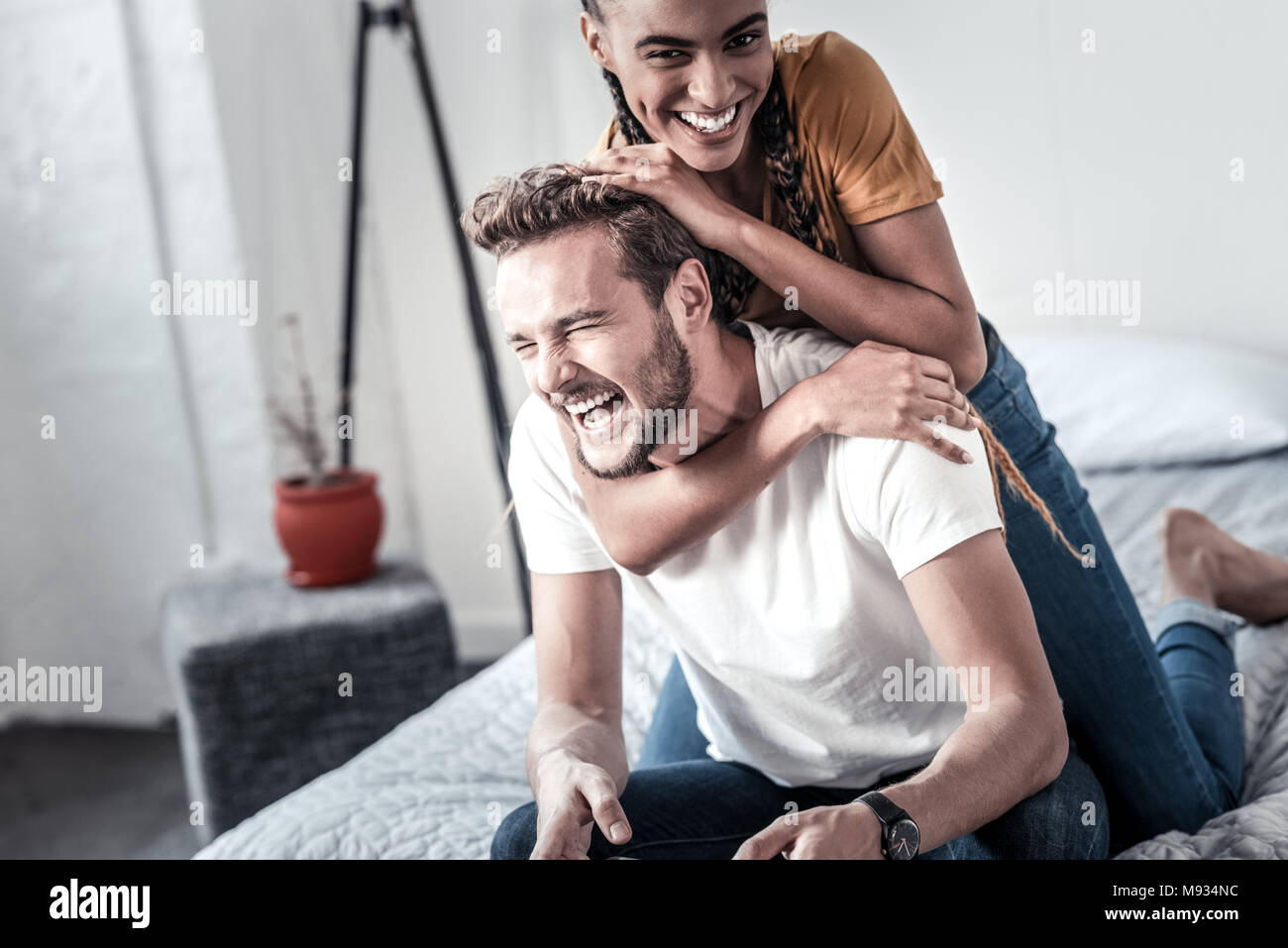 Happy joyful couple having fun Stock Photo - Alamy