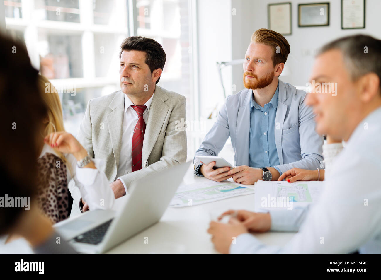 Business people discussing future plans Stock Photo - Alamy