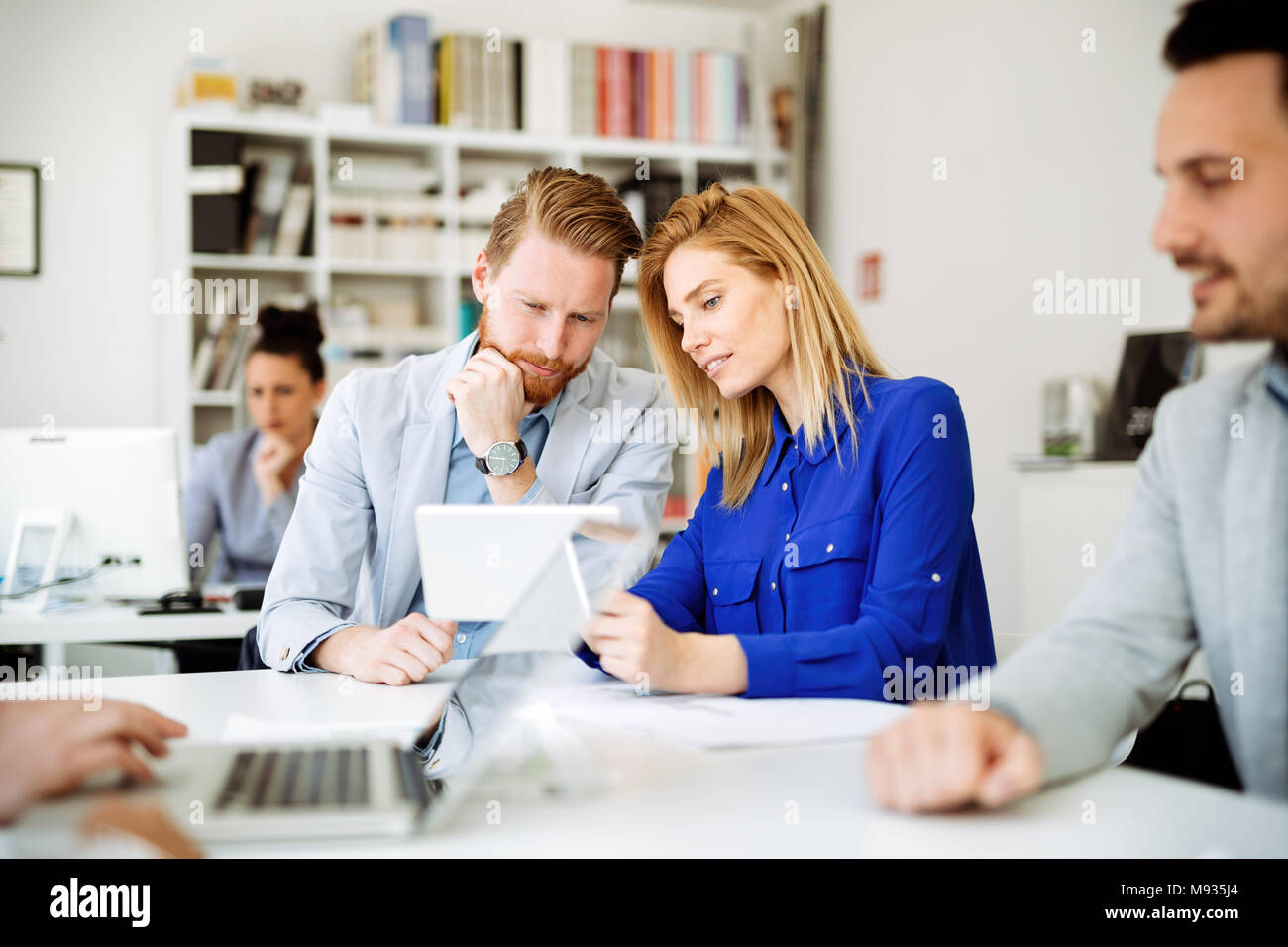 Business people using devices Stock Photo - Alamy