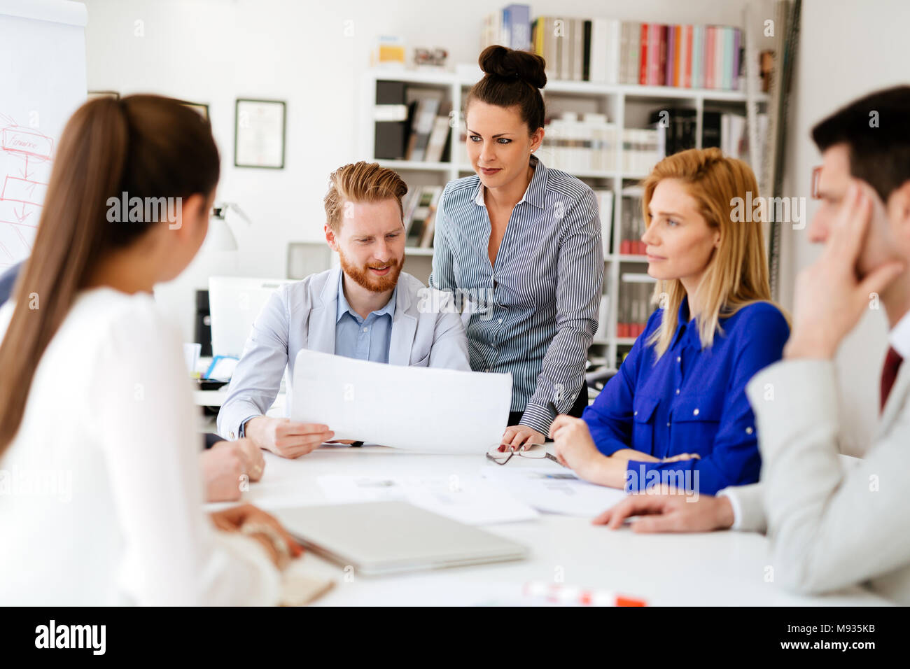 Coworkers planning startup goals Stock Photo - Alamy