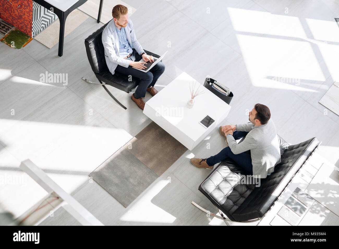 Business meeting in lobby Stock Photo - Alamy