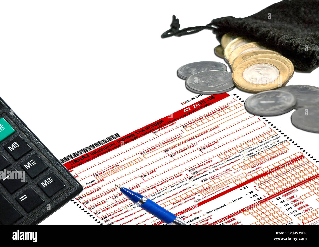 Tax Form ITR-1 with Indian Currency o 10 Rupee Coins in Bang with Pen ...