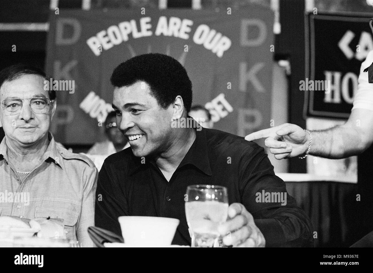 A smiling Muhammad Ali at pre fight press conference for his upcoming ...