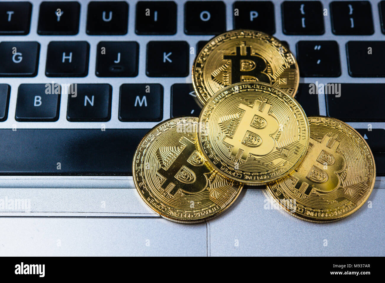 Silver bitcoin on keyboard hi-res stock photography and images - Alamy