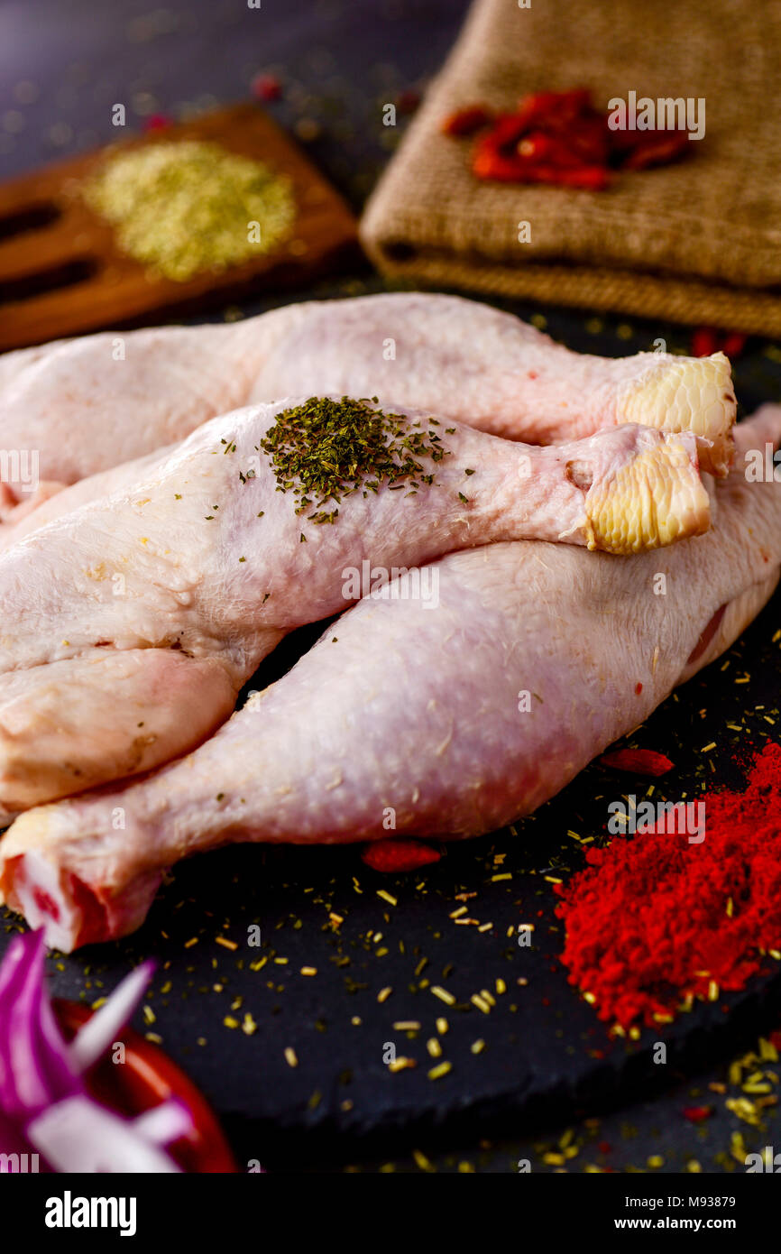 Seasoning sprinkled on whole chicken hi-res stock photography and ...