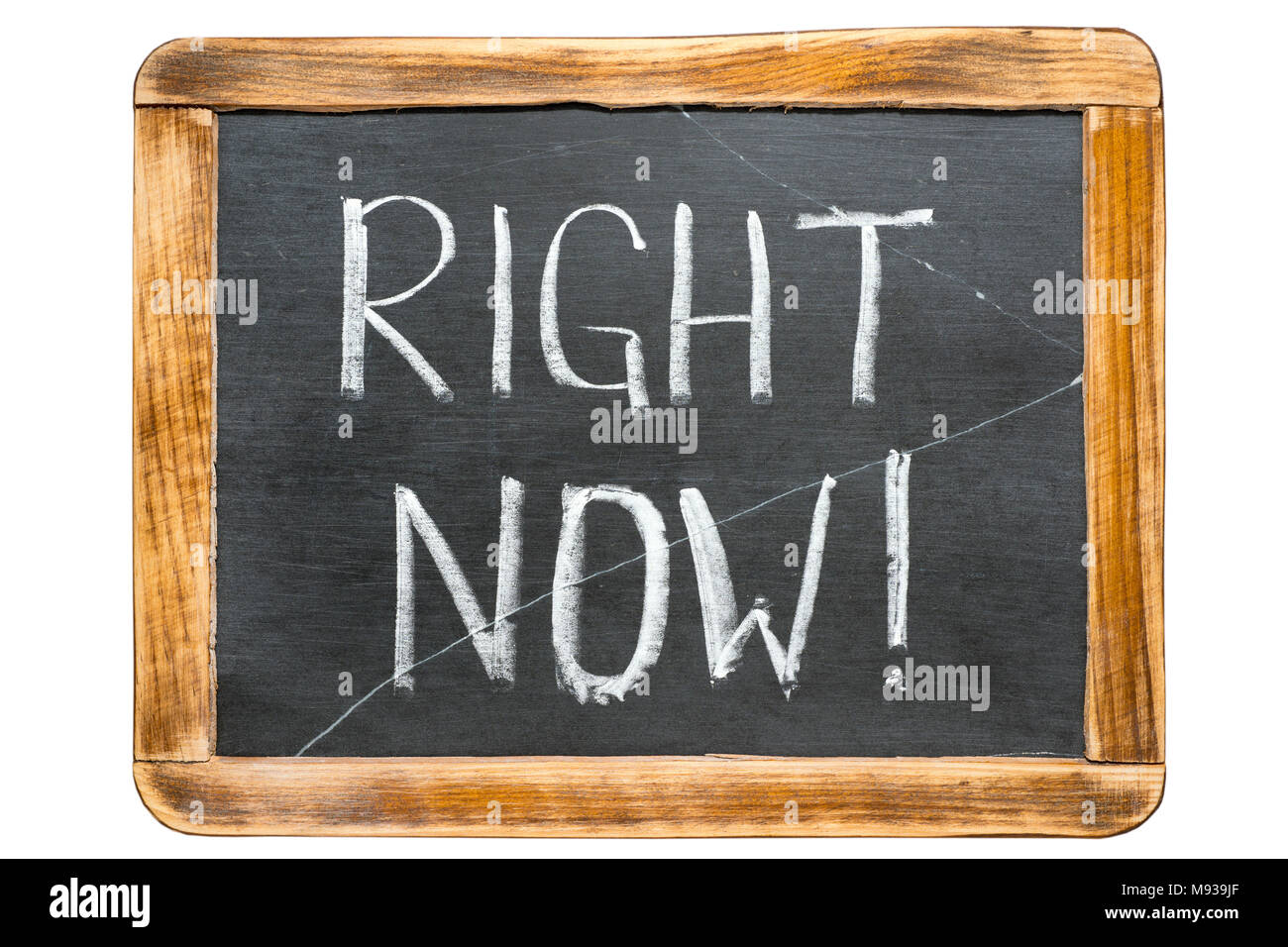 right now exclamation handwritten on vintage school slate board ...