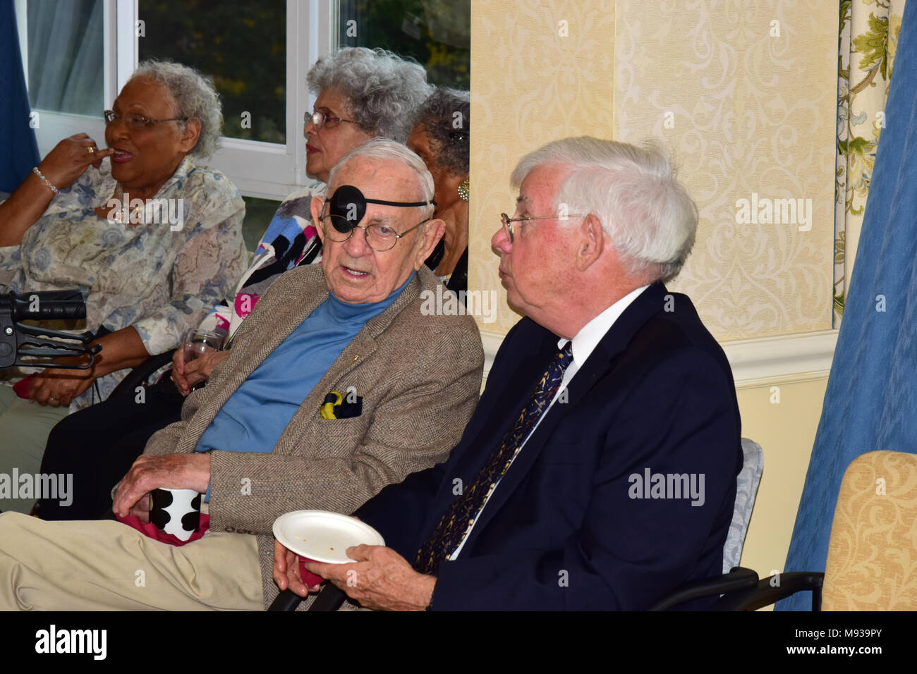 Seniors at living community celebrating Stock Photo - Alamy