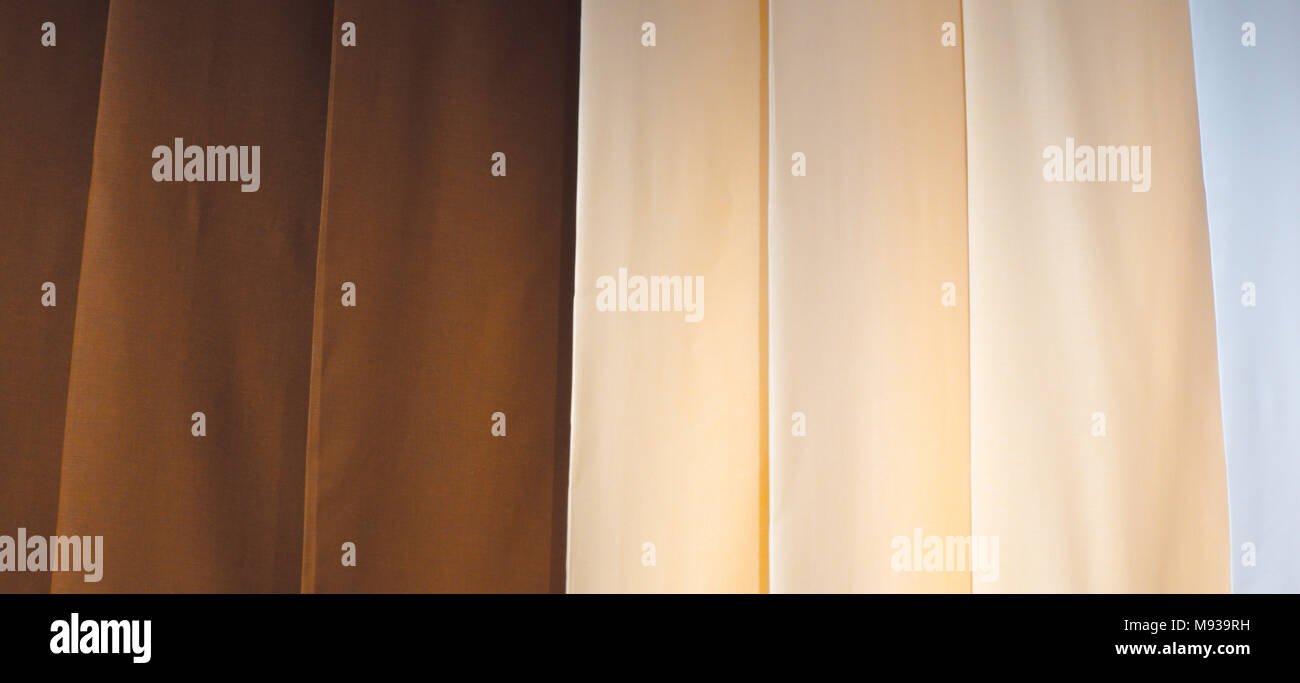 Displayed curtains samples hanging in the store Stock Photo - Alamy