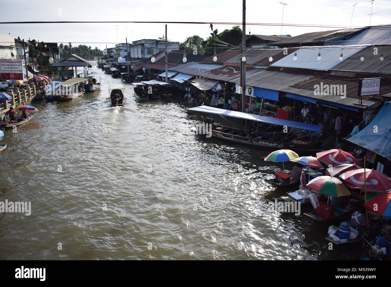 Wide view overlooking the mae klong river from the main bridge of ...