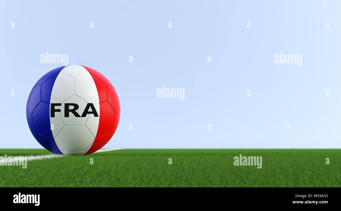Soccer ball in french national colors on a soccer field. Copy space on ...