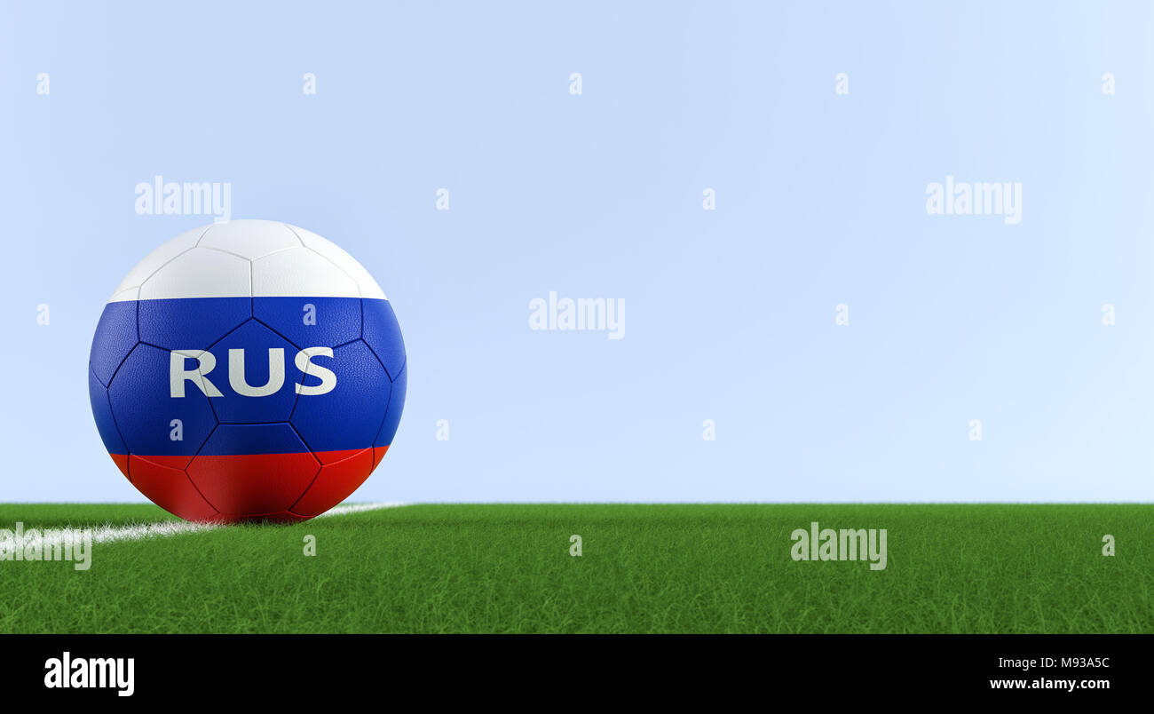 Soccer ball in russian national colors on a soccer field. Copy space on ...