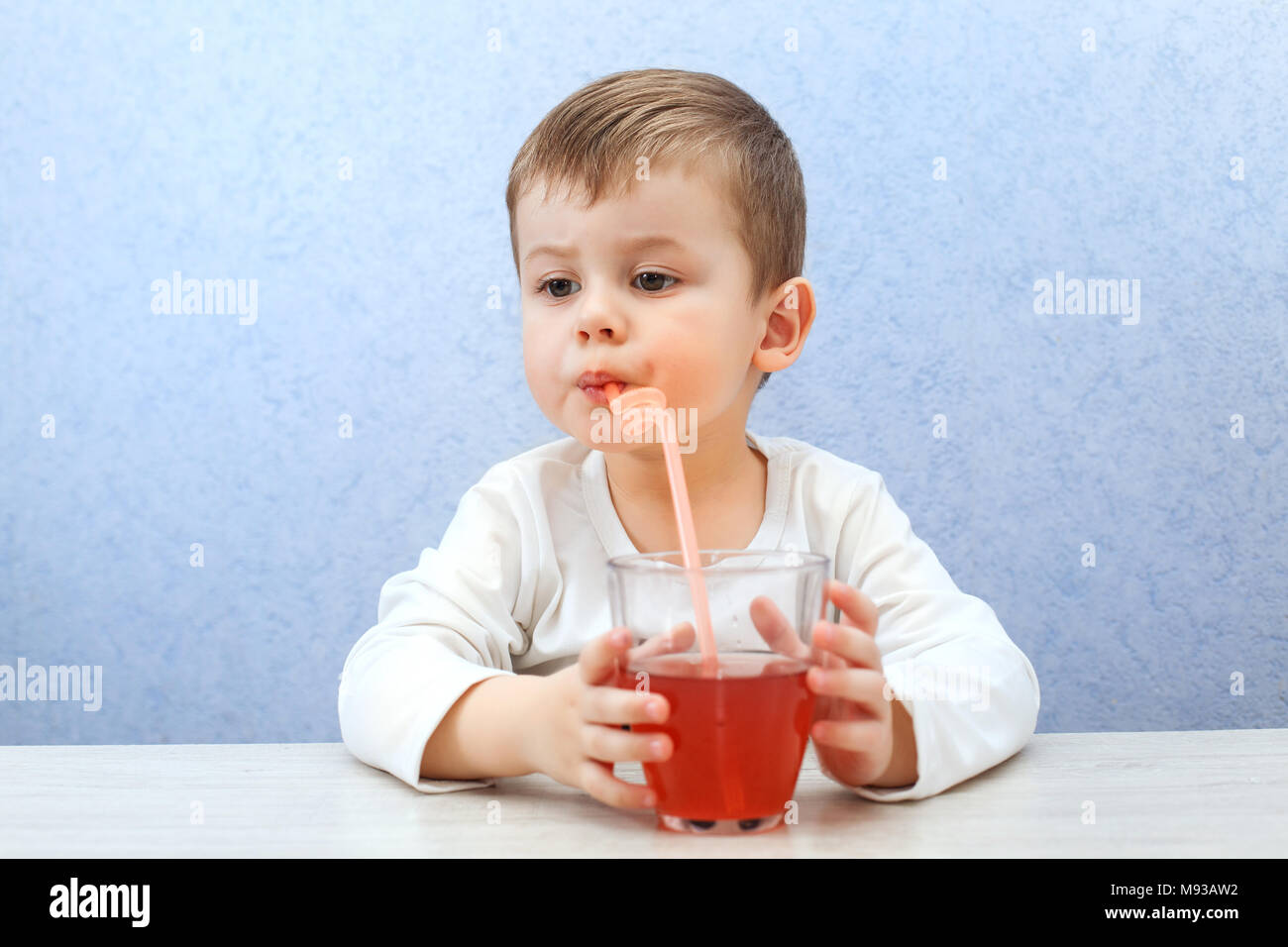 Child drinking grape juice hi-res stock photography and images - Alamy