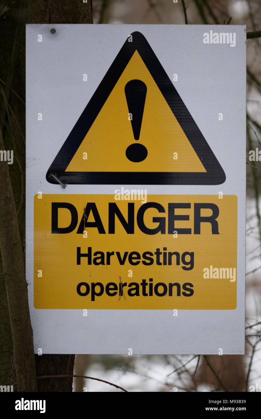 DANGER Harvesting operations sign exclamation mark warning black text ...