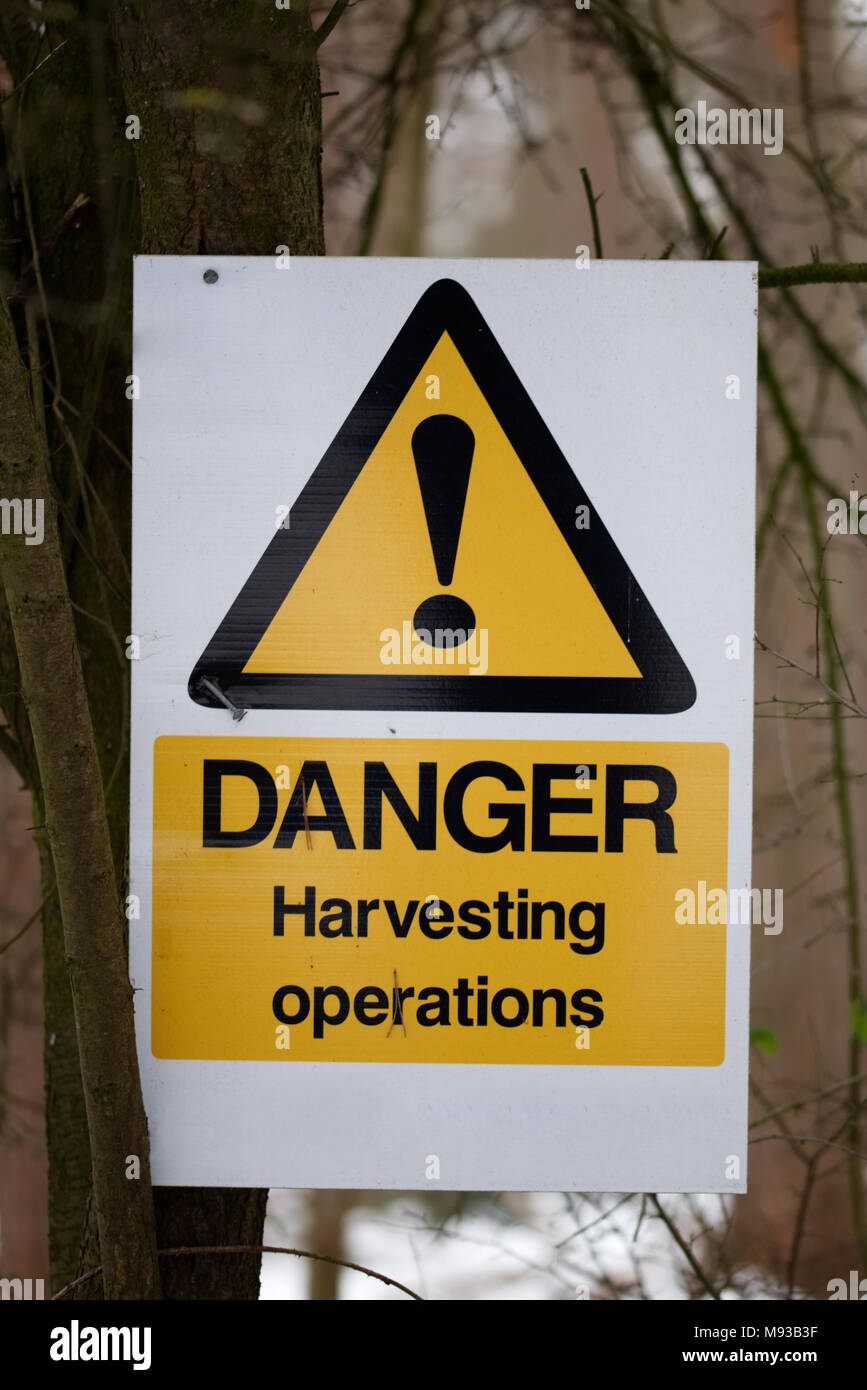 DANGER Harvesting operations sign exclamation mark warning black text ...