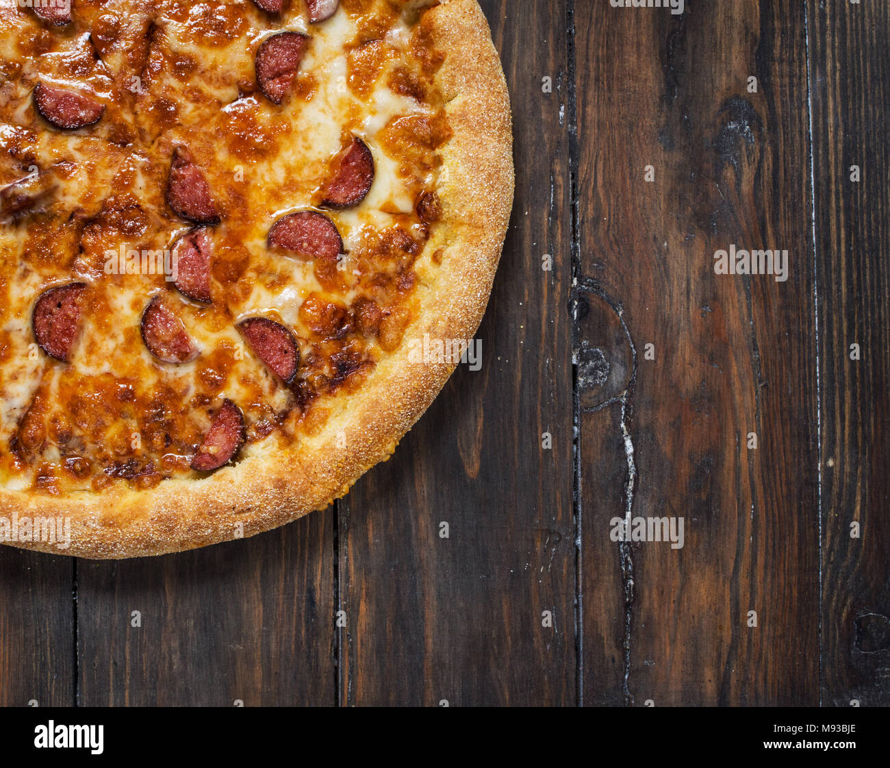 Texas pizza on rustic, vintage style wood background. Top view, text ...