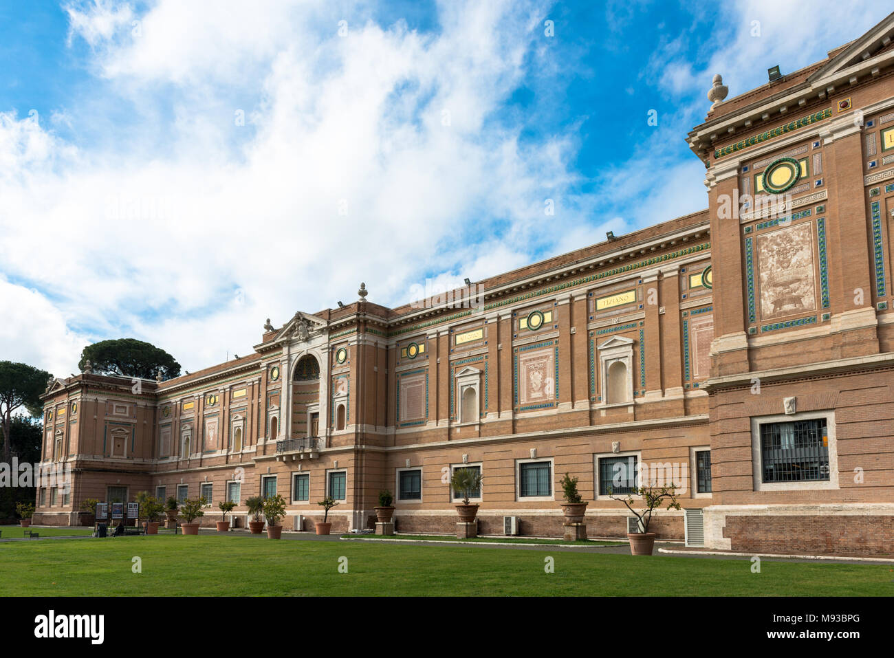 Horizontal picture of the garden and building inside of Vatican Museum ...