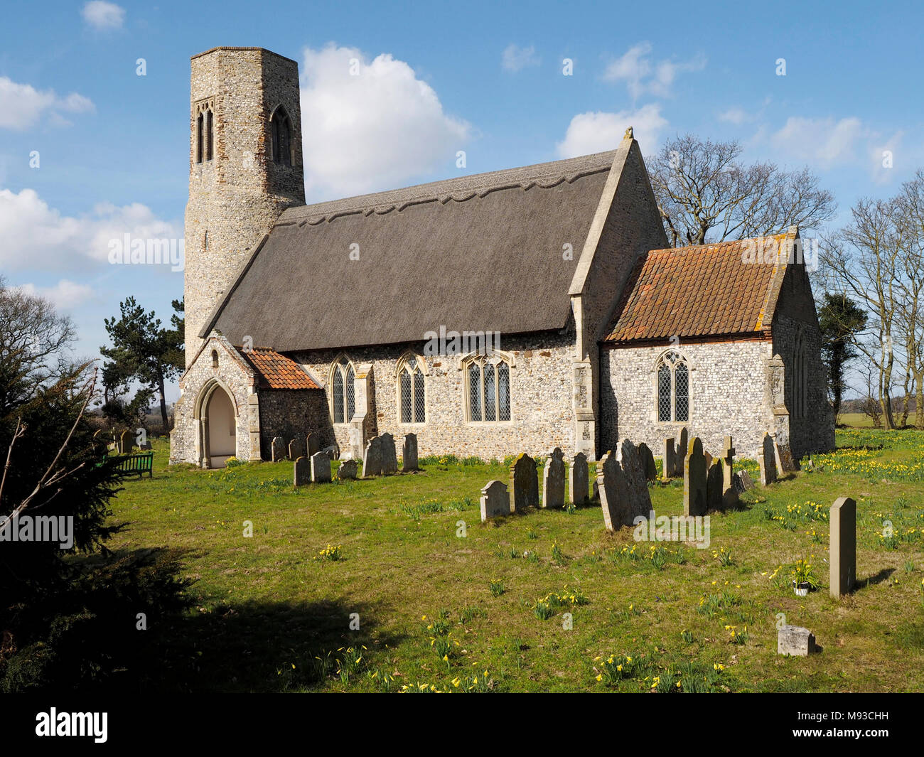 The medieval flint walled and thatch roofed church at Edingthorpe ...