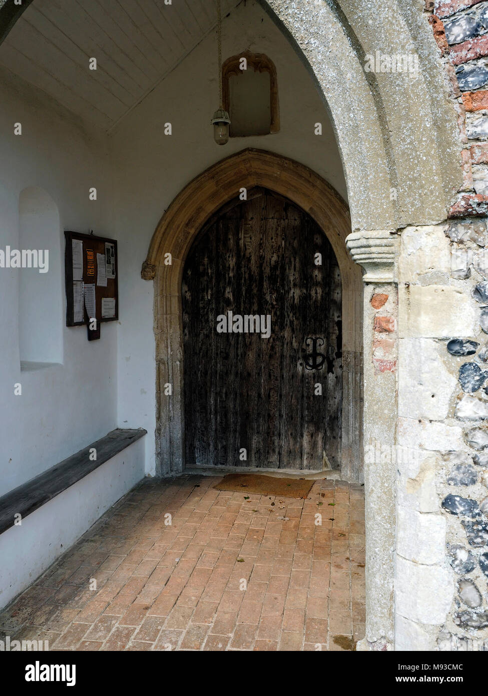The entrance porch to the medieval church in Edingthorpe, Norfolk dates ...