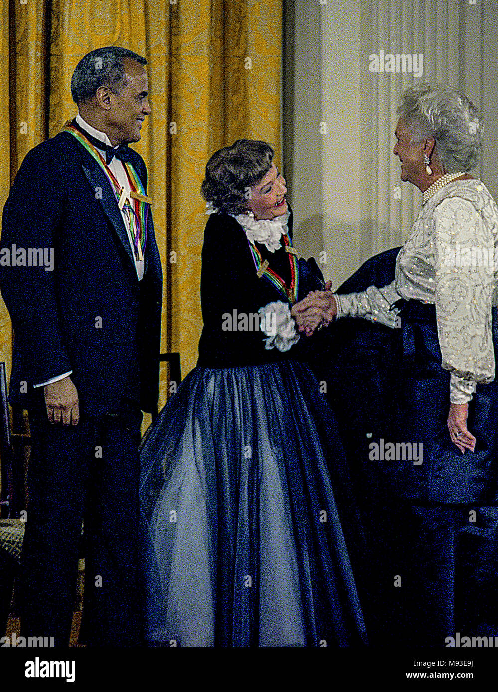 Washington, DC., USA, December 3, 1989 First Lady Barbara Bush shakes ...