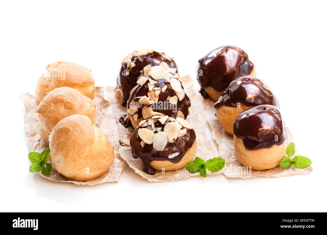 Homemade assorted profiteroles isolated on white Stock Photo - Alamy