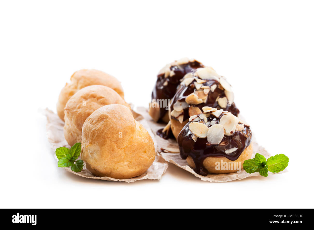 Homemade assorted profiteroles isolated on white Stock Photo - Alamy