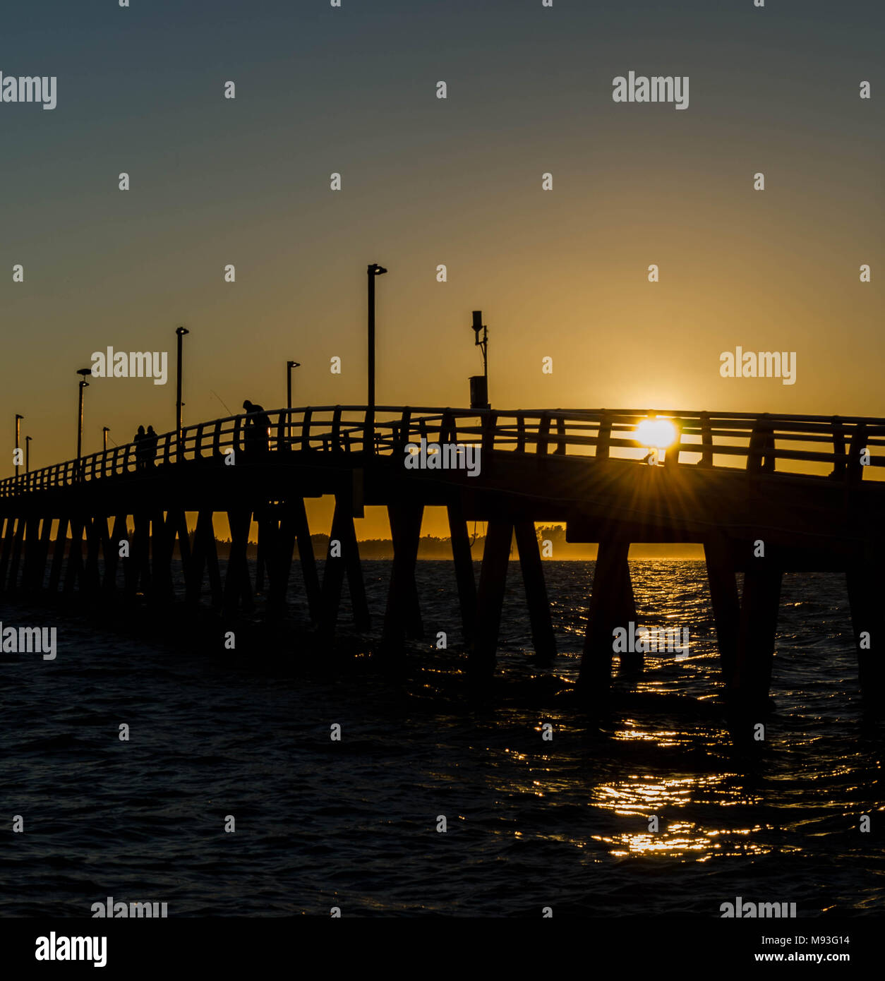 Sunset view from under the John Ringling causeway bridge in Sarasota ...
