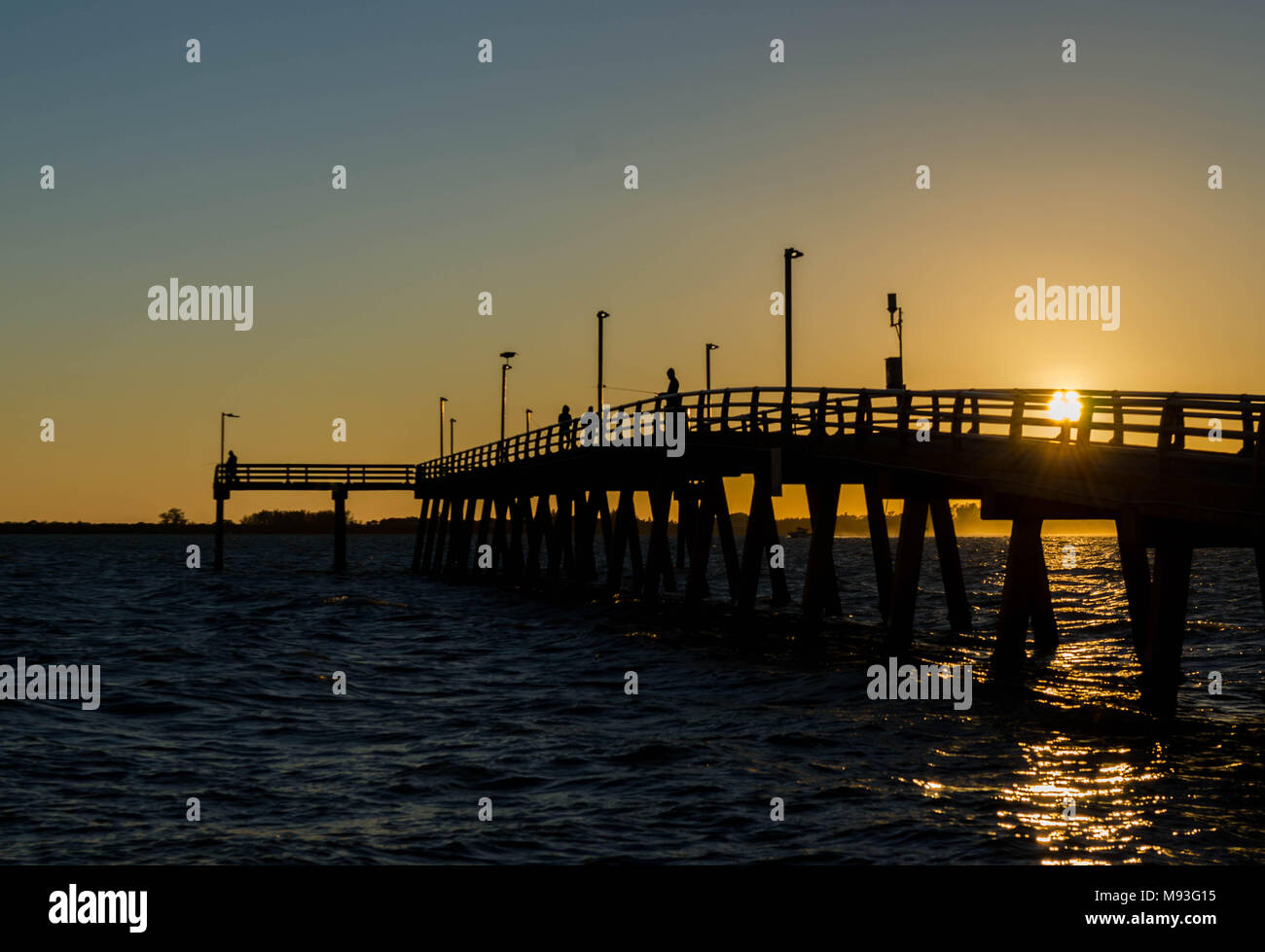 Sunset view from under the John Ringling causeway bridge in Sarasota ...