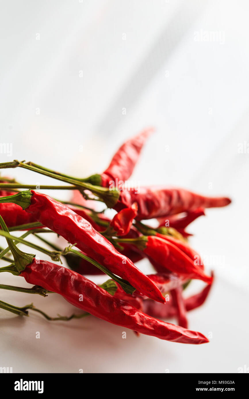 Red hot peppers dried on display in natural light Stock Photo - Alamy