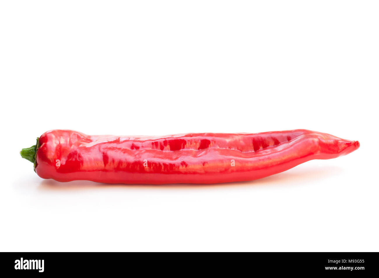 Long sweet red pepper isolated on white Stock Photo - Alamy