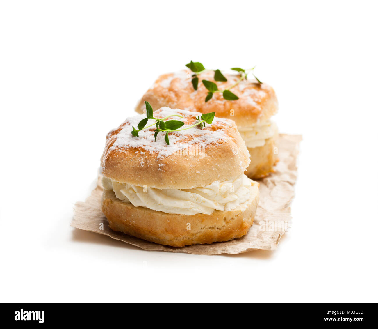 Traditional scones with cream isolated on white Stock Photo - Alamy