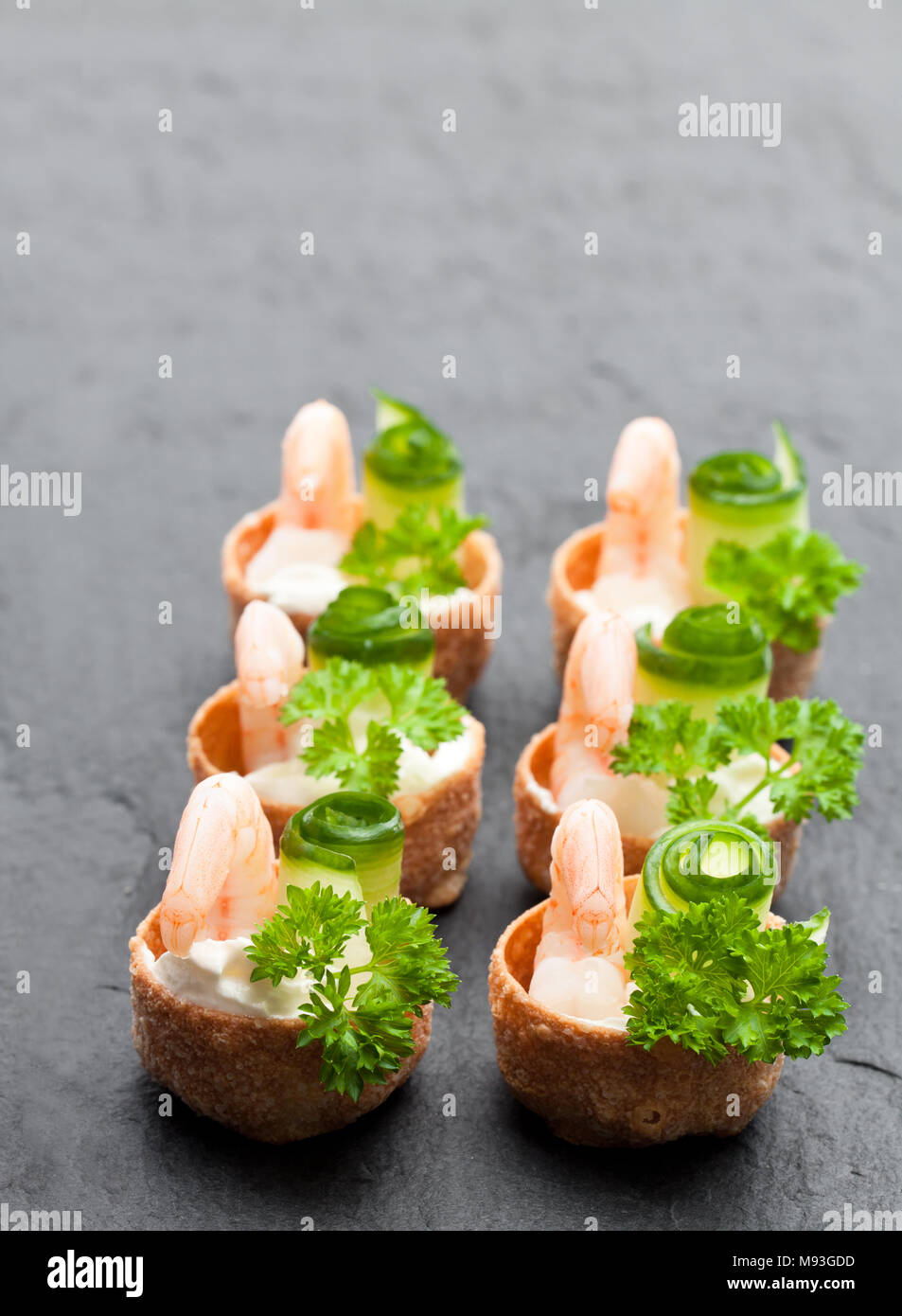 Salted croustades crispy pastry stuffed with cream cheese and prawns on ...