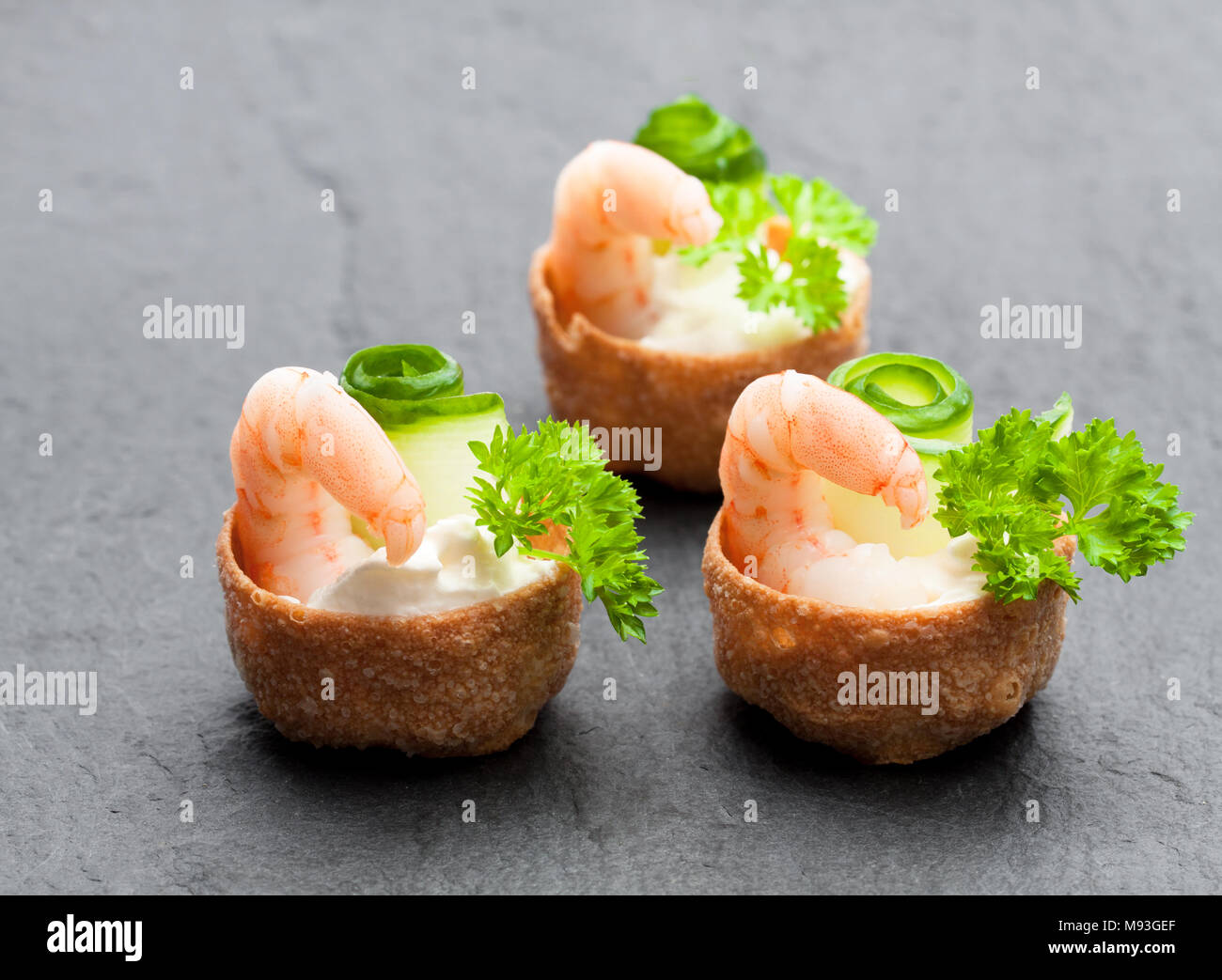 Salted croustades crispy pastry stuffed with cream cheese and prawns on ...