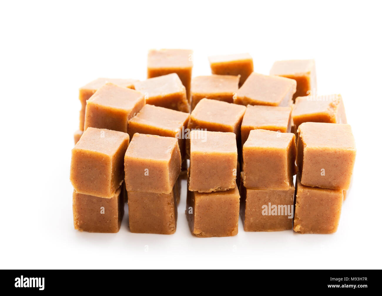 Toffee cubes isolated on white hi-res stock photography and images - Alamy