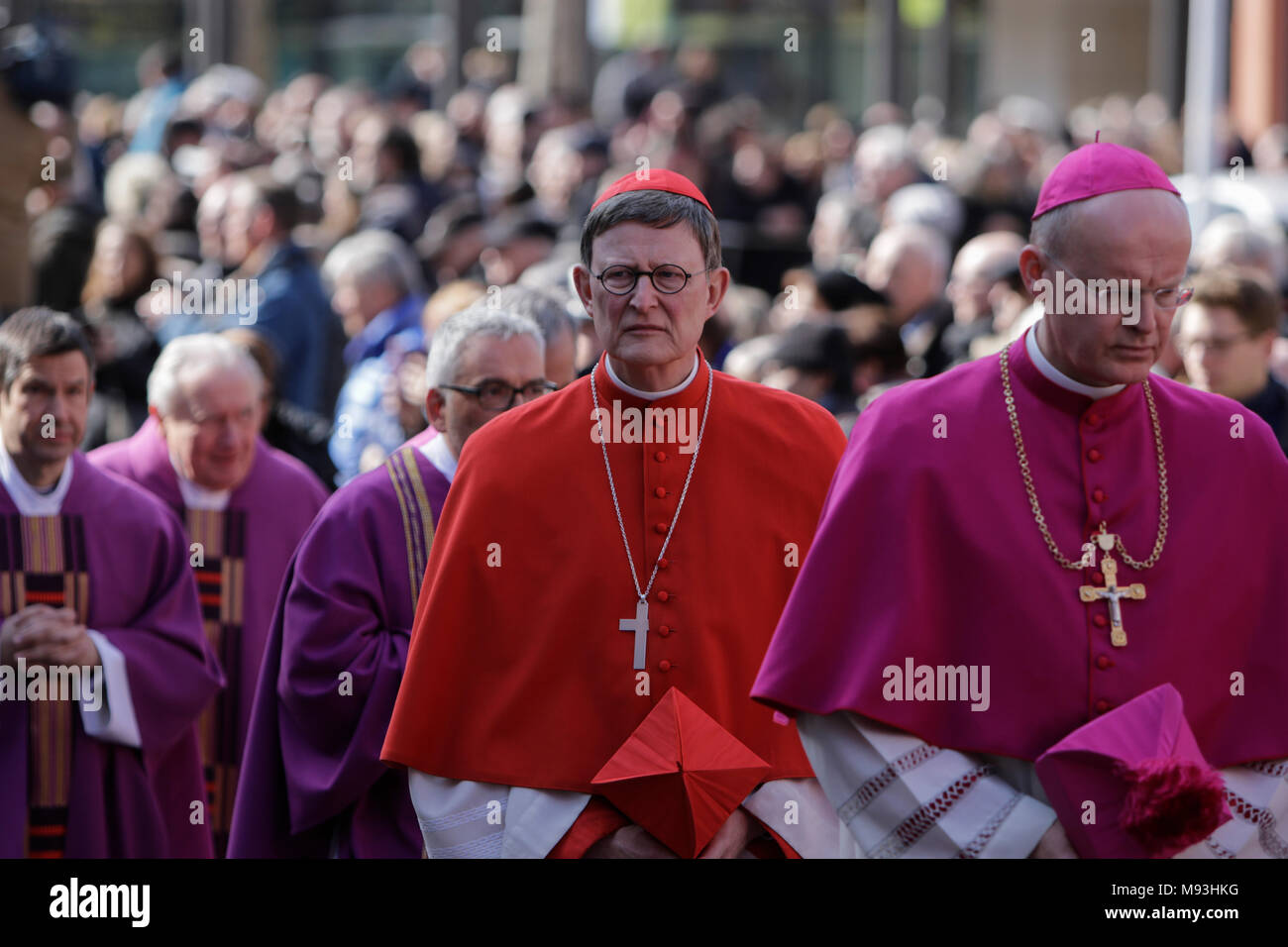 The Archbishop of Cologne Cardinal Rainer Maria Woelki (in red) walks ...