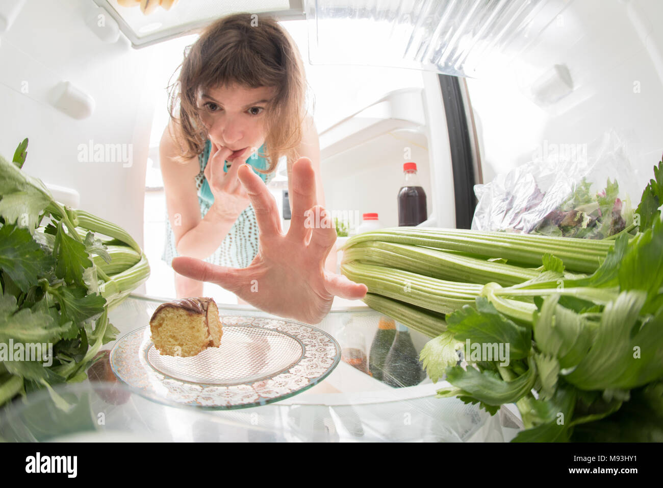 Grabbing food from fridge hi-res stock photography and images - Alamy