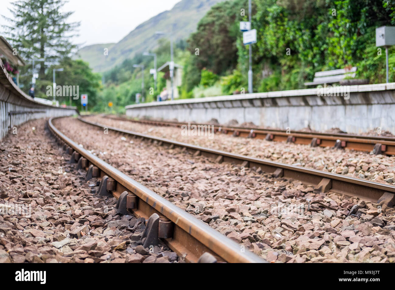 Close up of railway at the train station with blurred background of ...