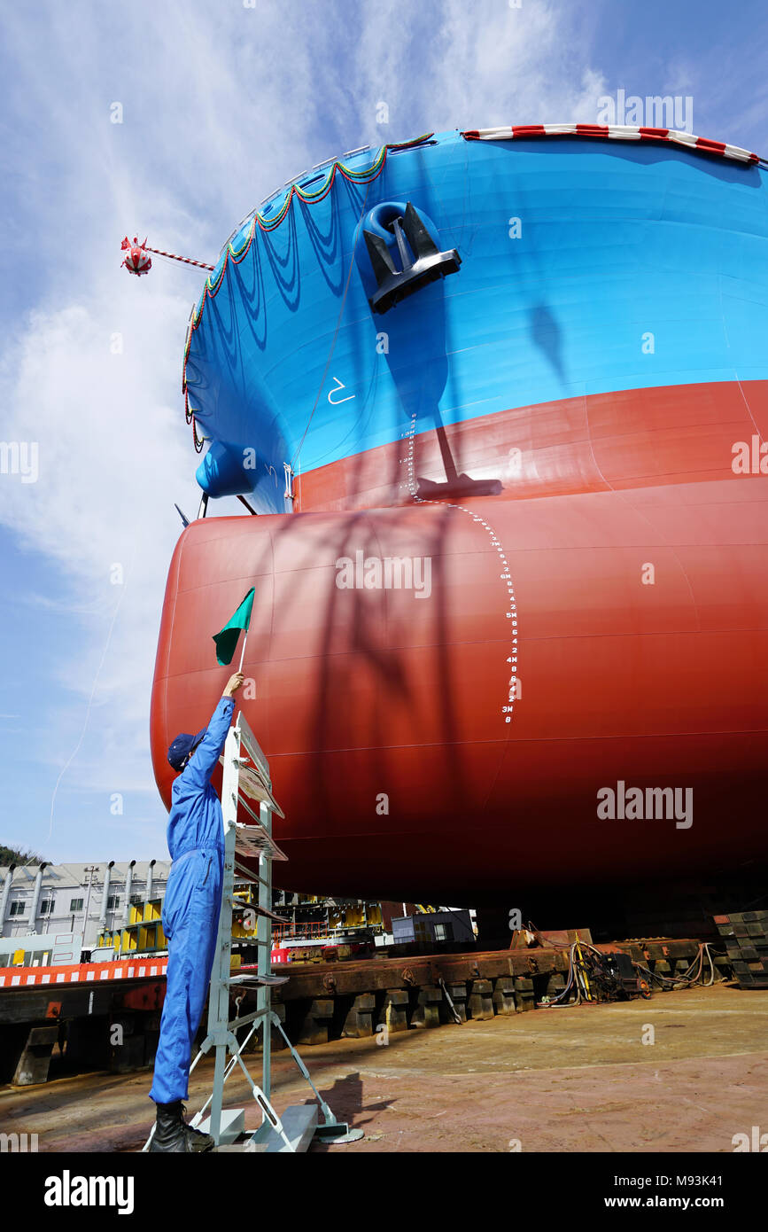 Newly built vessel during launching of the shipyard in Japan Stock ...