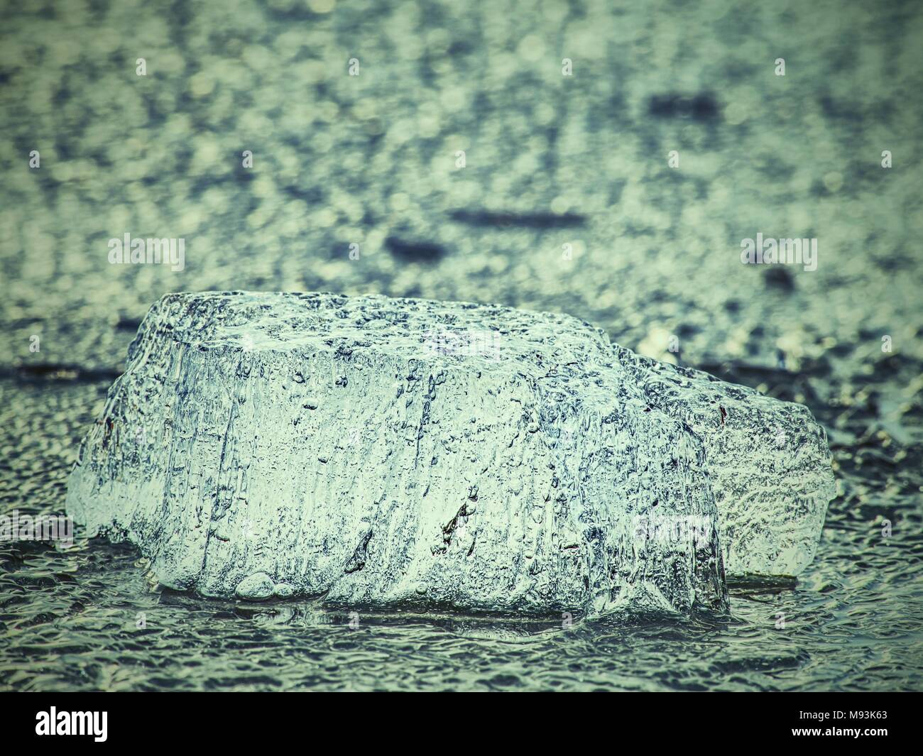 Sad view to nroken piece of ice with sharp cracks. Broken ice floe ...