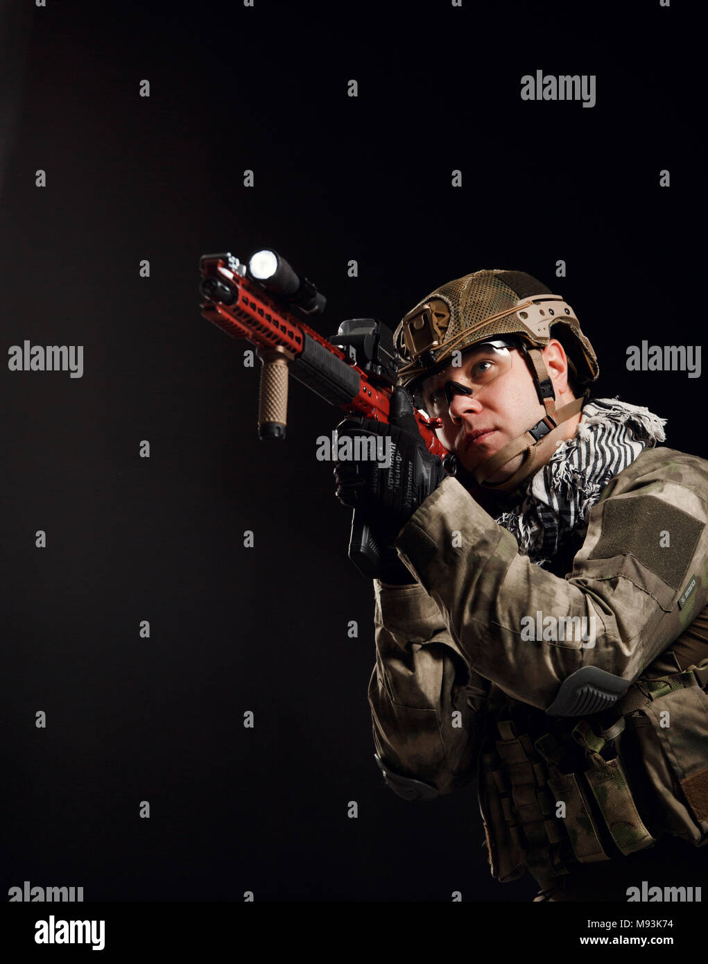 Picture of aiming soldier with gun Stock Photo - Alamy