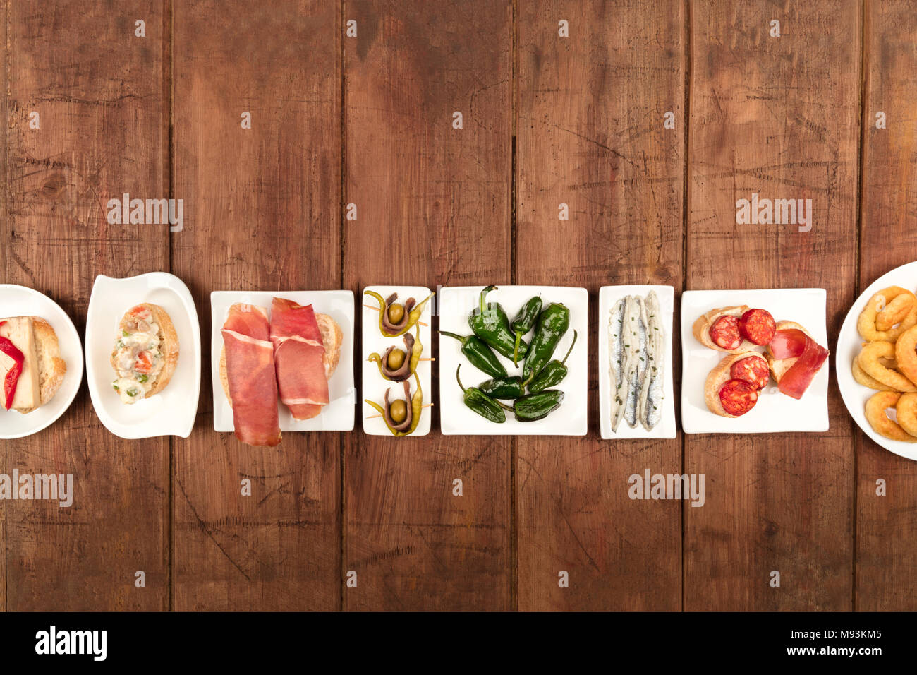 An overhead photo of an assortment of Spanish tapas food, shot from the ...