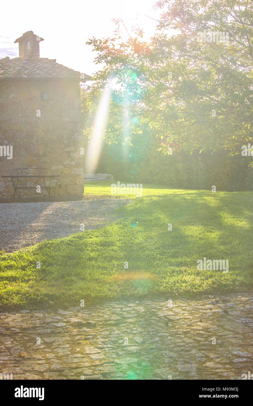 Beautiful medieval Italian house and garden in spring with an abundance ...