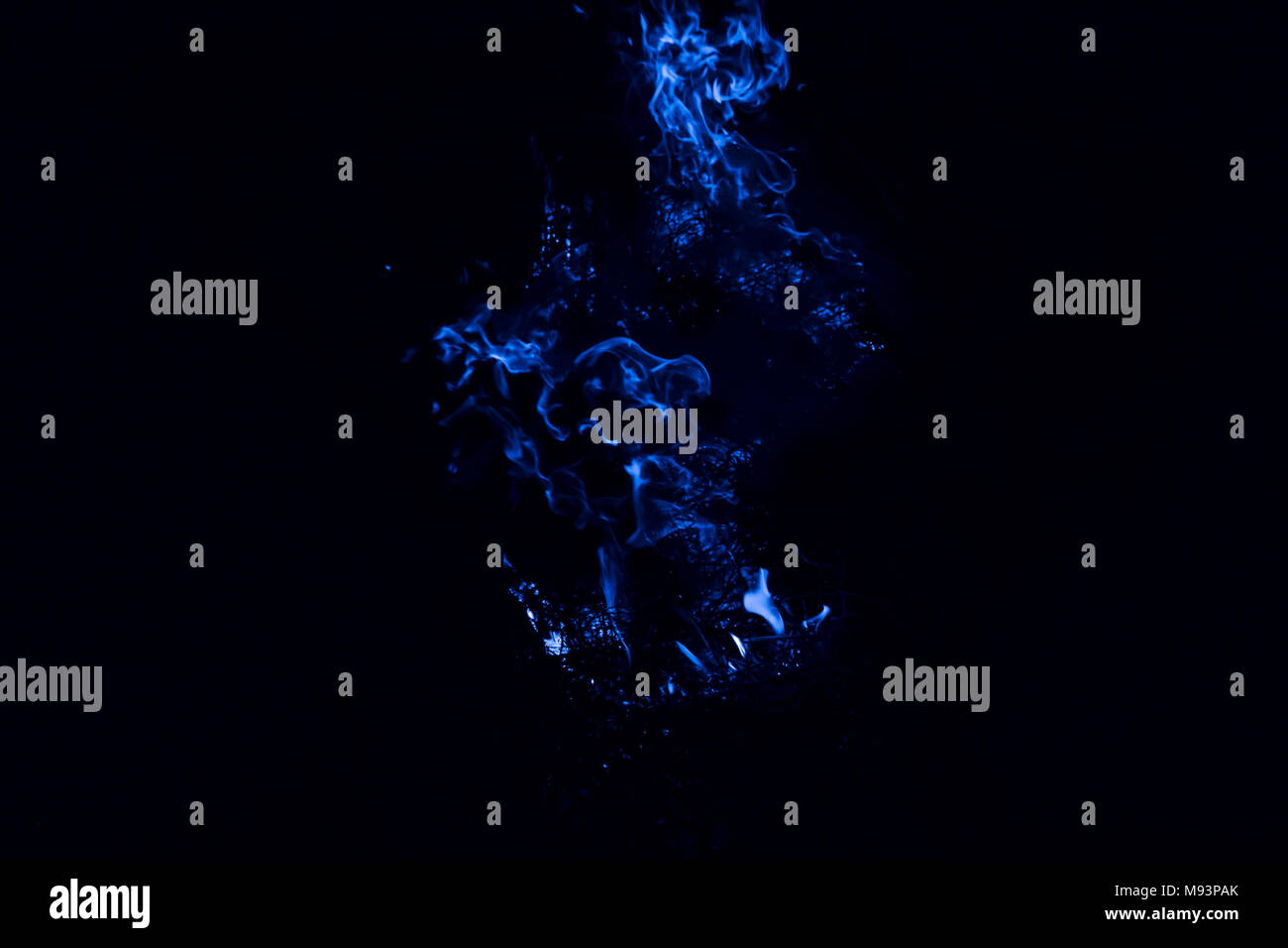 Blue flame. Fire. Burning of rice straw at night Stock Photo - Alamy