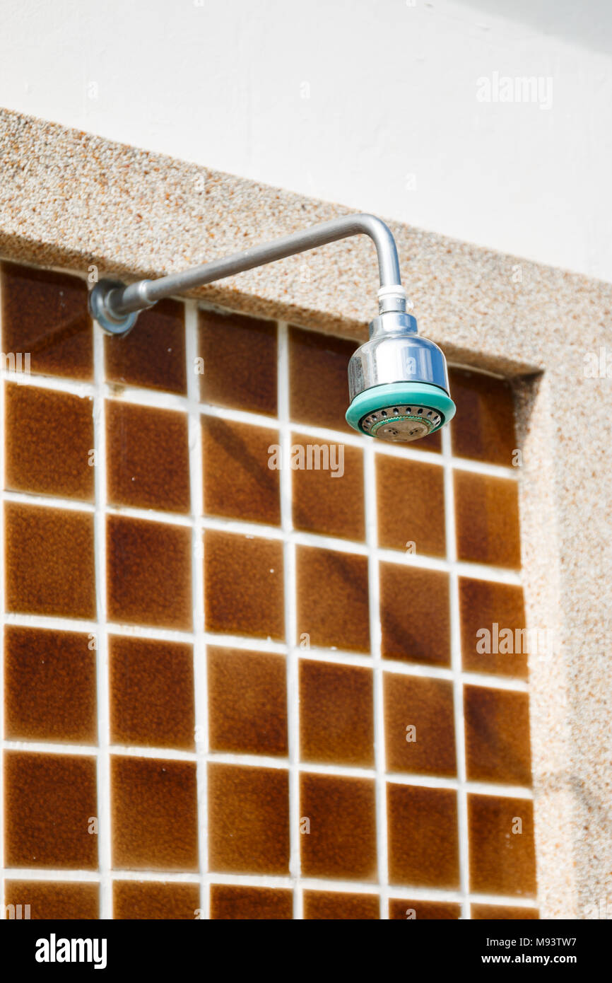 Silver shower head near swimming pool Stock Photo - Alamy