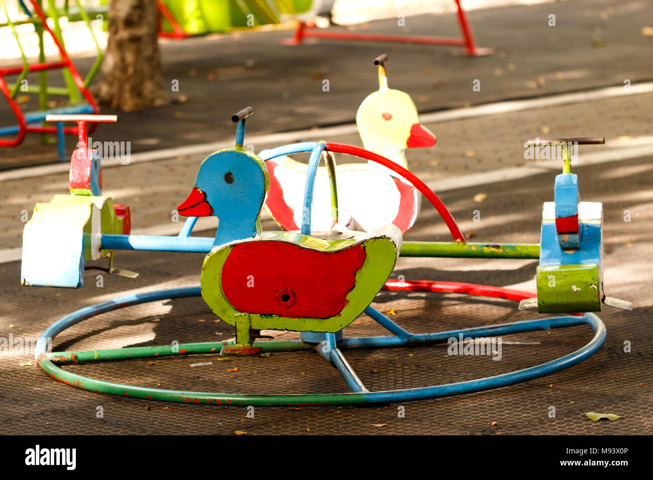Duck Carousel toy in school Stock Photo - Alamy