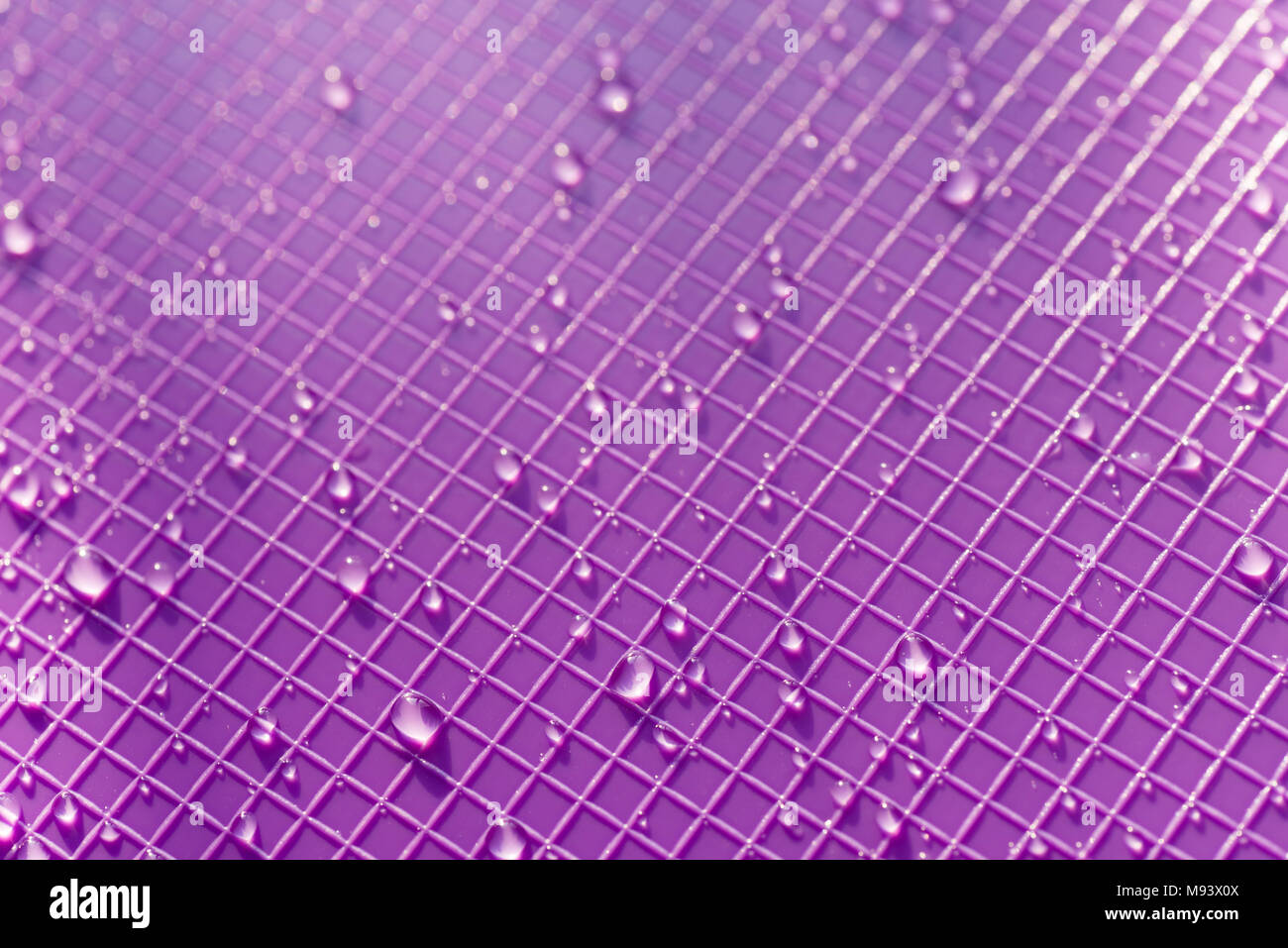 water drops on violet color plastic background texture Stock Photo - Alamy