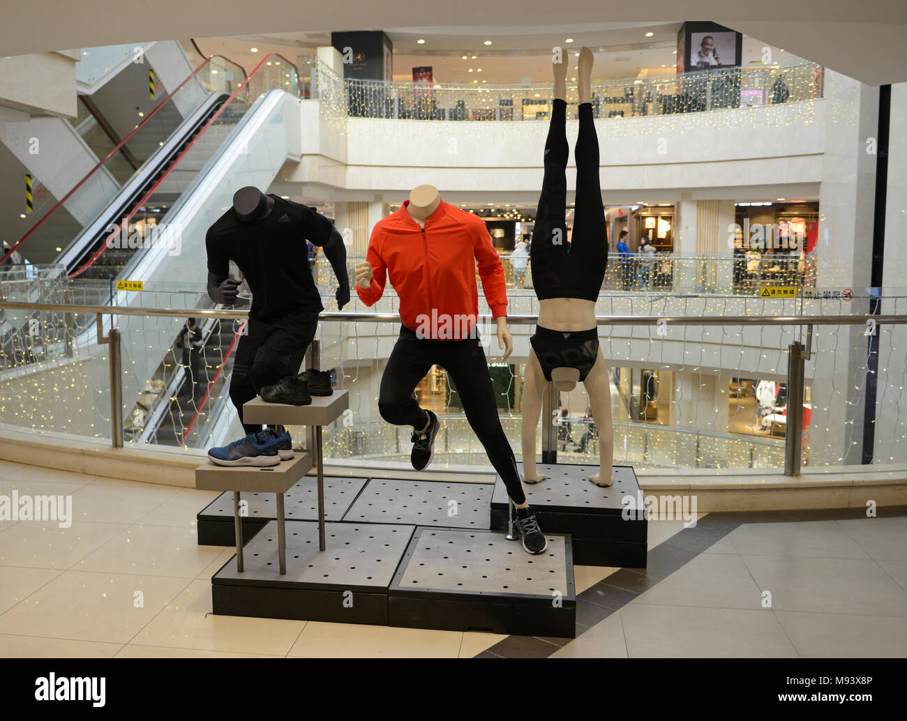 Clothes display in a shopping centre in Beijing, China Stock Photo - Alamy