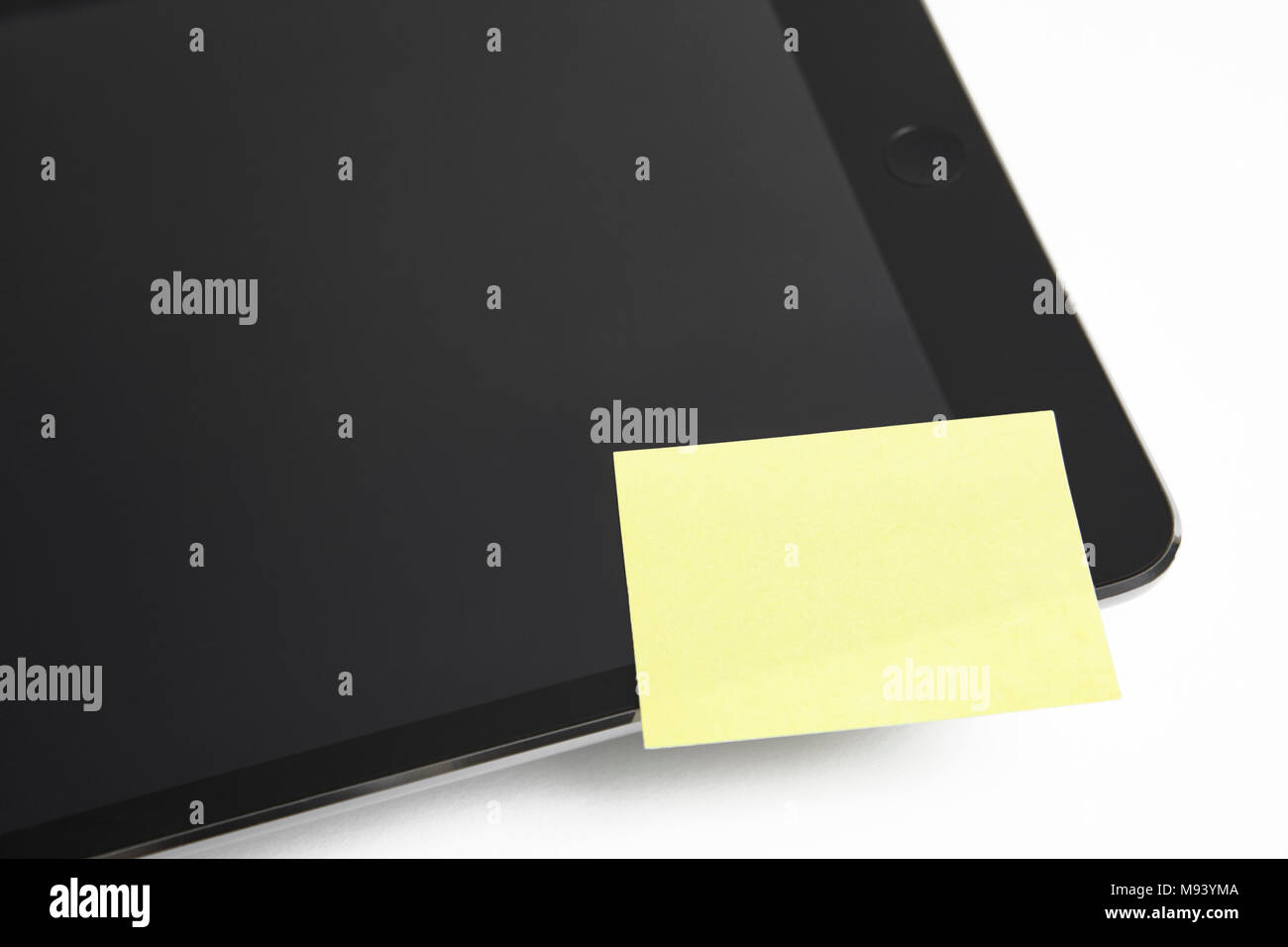 Tablet and post it on display isolated on white. Notes Stock Photo - Alamy